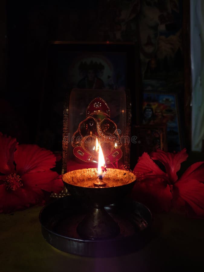 Ganesh Idol with Lamp, Ganpati Sthapana at Home in Lockdown Stock Photo ...