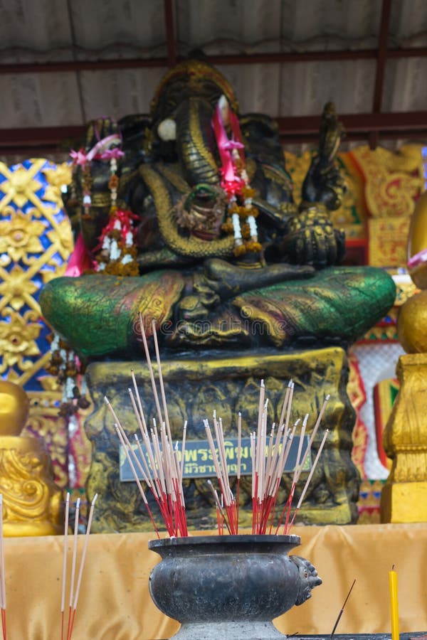 Ganesha with incense stick stock image. Image of gift - 63426031