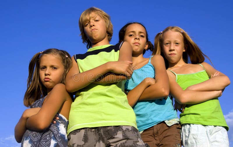 Gang of four serious kids stock image. Image of serious - 10518911