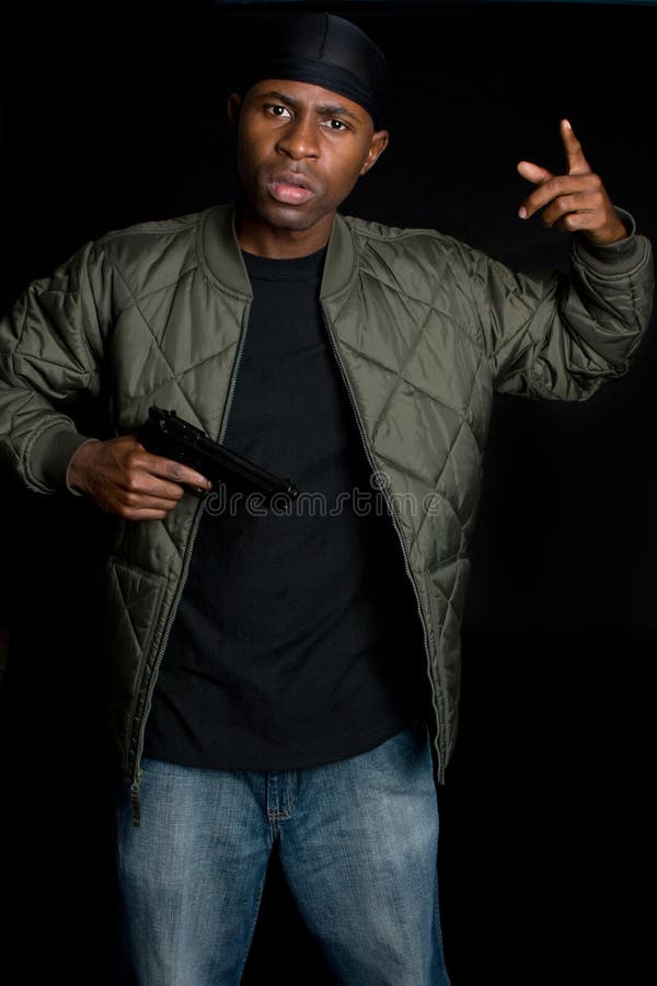 Gang Member Holding Gun stock image. Image of banger, pointing - 7449637