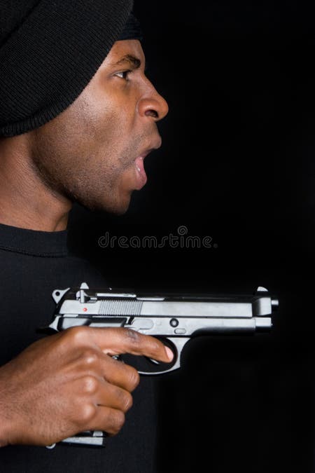 Gangster Holding Gun stock photo. Image of pistol, facial - 8777842
