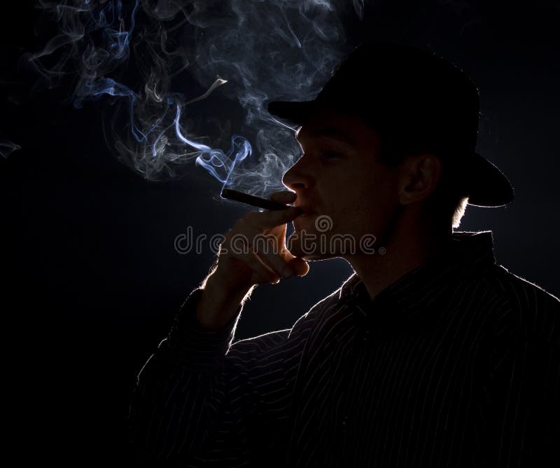 Gangster smoking stock image. Image of head, light, close - 10585289