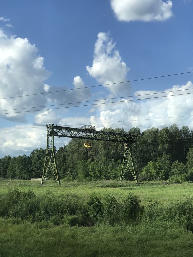 A Gantry Crane Stands by the Forest Stock Photo - Image of factory ...
