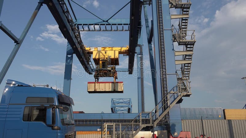 Unloading a Container from a Truck Using a Truck Crane Stock Footage ...