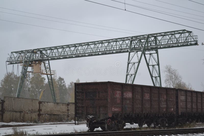 Gantry crane and wagons stock photo. Image of railway - 60668442