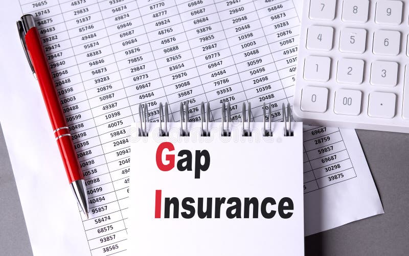 GAP INSURANCE Text on Notebook with Chart , Pen and Calculator Stock ...