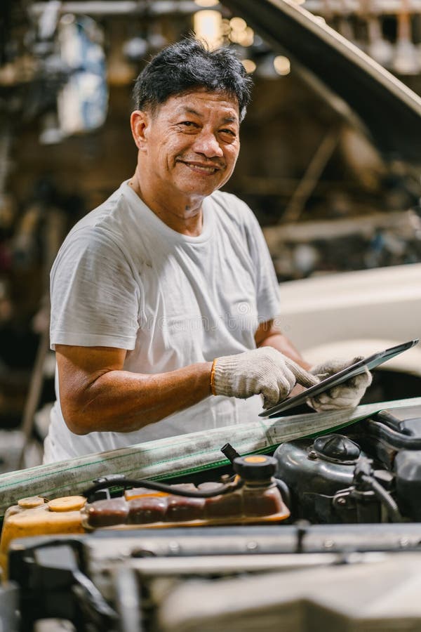 Garage Asian Professional Working Auto Service Checking Engine ...