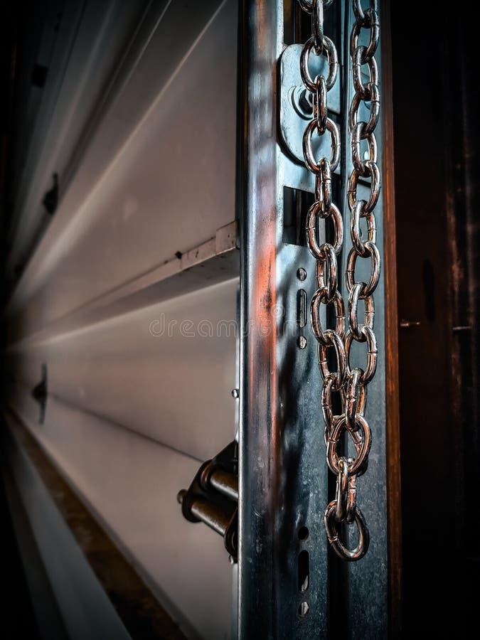 The Garage Chain stock photo. Image of darkness, architecture - 267003382
