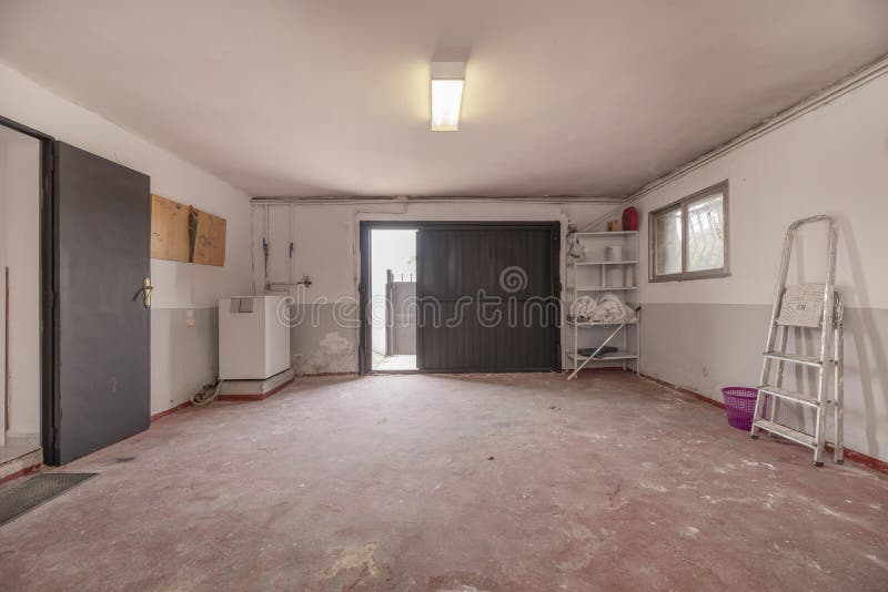 A Garage is a Covered and Closed Space, Usually Adjacent To a Home or ...