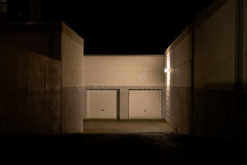 Garage entrance at night stock image. Image of basement - 89165137