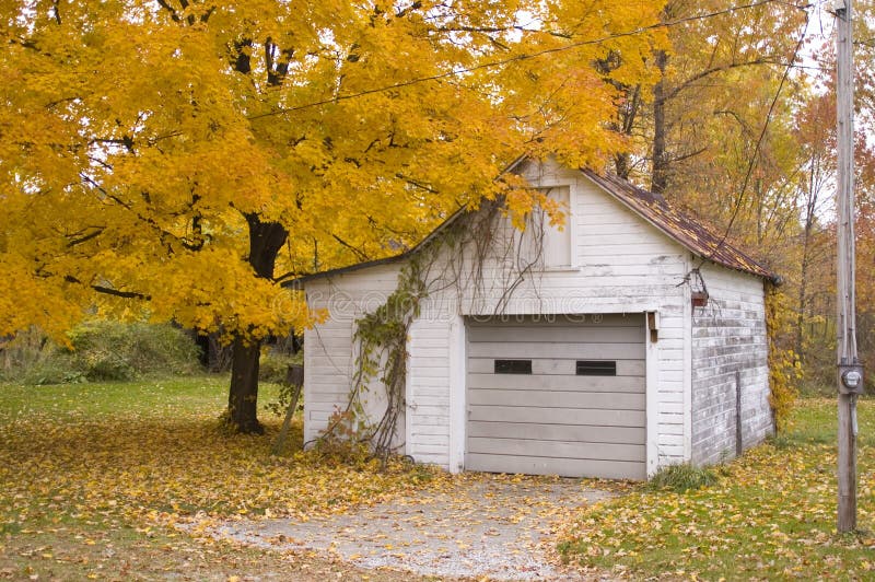 Garage in fall stock photo. Image of yellow, white, door - 11559840
