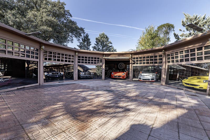 A Garage with High-end Cars Parked Editorial Photography - Image of ...