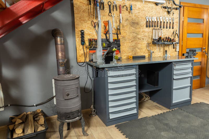 Garage Interior with Mechanic Workspace Holds Neatly Organized Tools ...