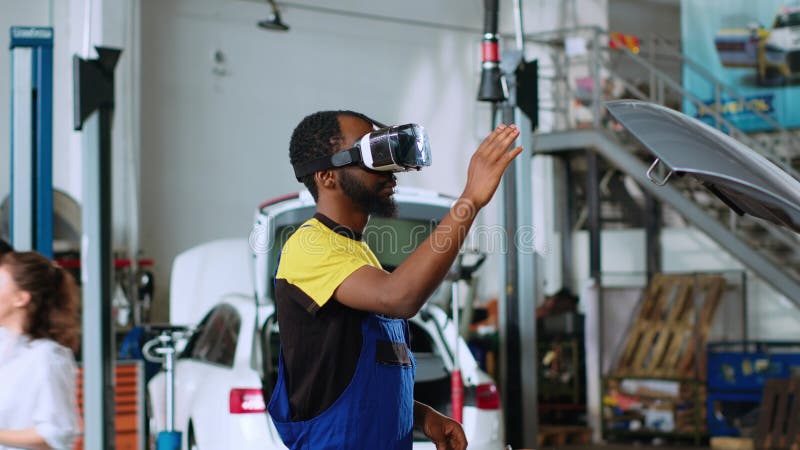 Garage Mechanic Using Virtual Reality Stock Video - Video of equipment ...