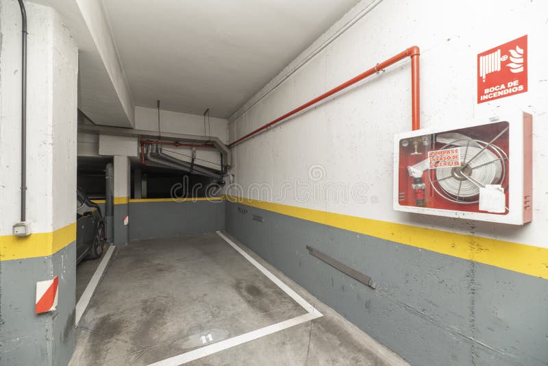Garage Space on the Ground Floor of a Residential Building with a Fire ...