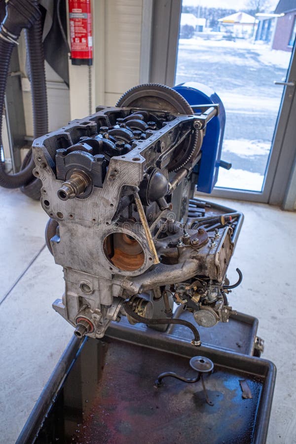 In the Garage There is an Opened Engine Block of a Car Stock Image ...