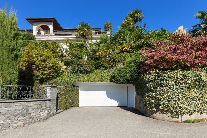 Garage of a Villa, Exterior Stock Image - Image of estate, street: 68102601