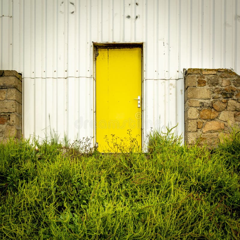 Garage with a yellow door stock photo. Image of color - 262328442