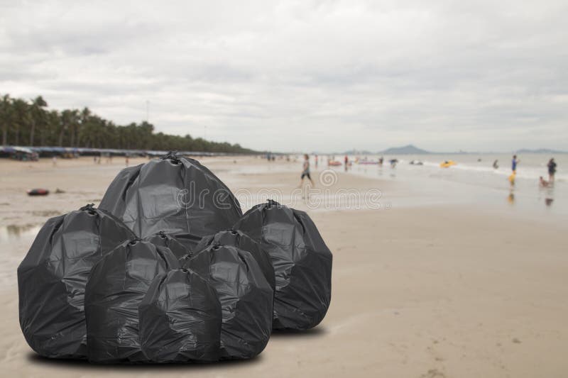 Garbage bag the beach stock image. Image of ocean, housework - 112315389