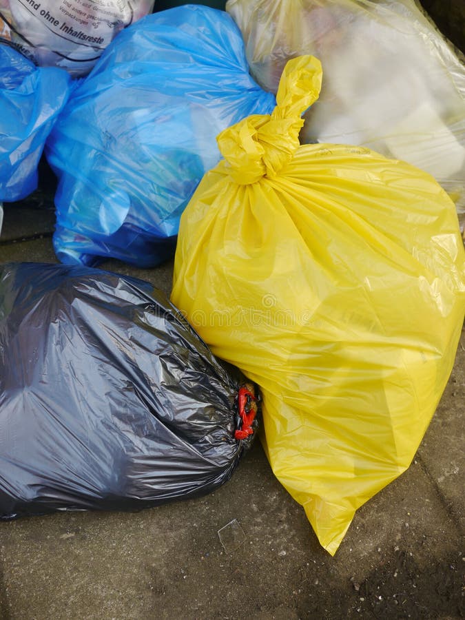 Many Orange Garbage Bags at Curb Stock Image - Image of orange, clean ...