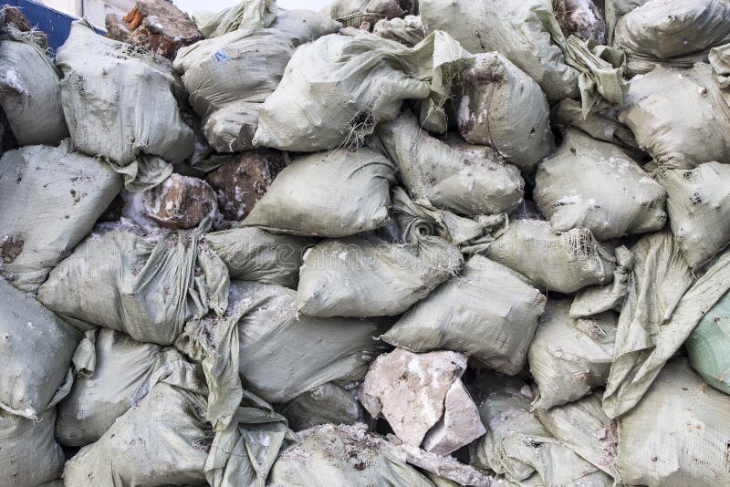 Garbage Bags in a Container Near House Under Construction Stock Photo ...