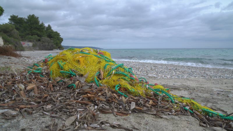 Garbage on the Beach an Abandoned Fishing Net Stock Video - Video of ...