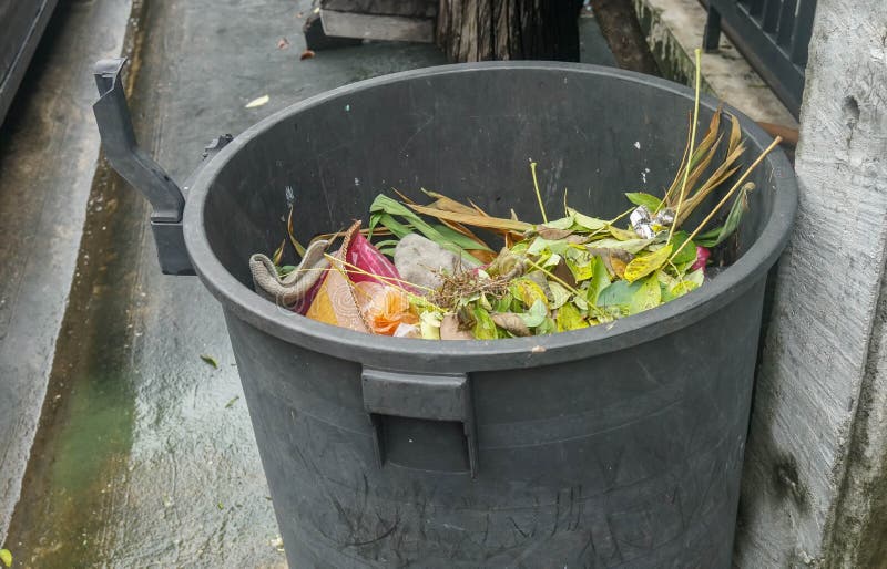 Garbage in Big Black Plastic Trash Bin Stock Image - Image of litter ...