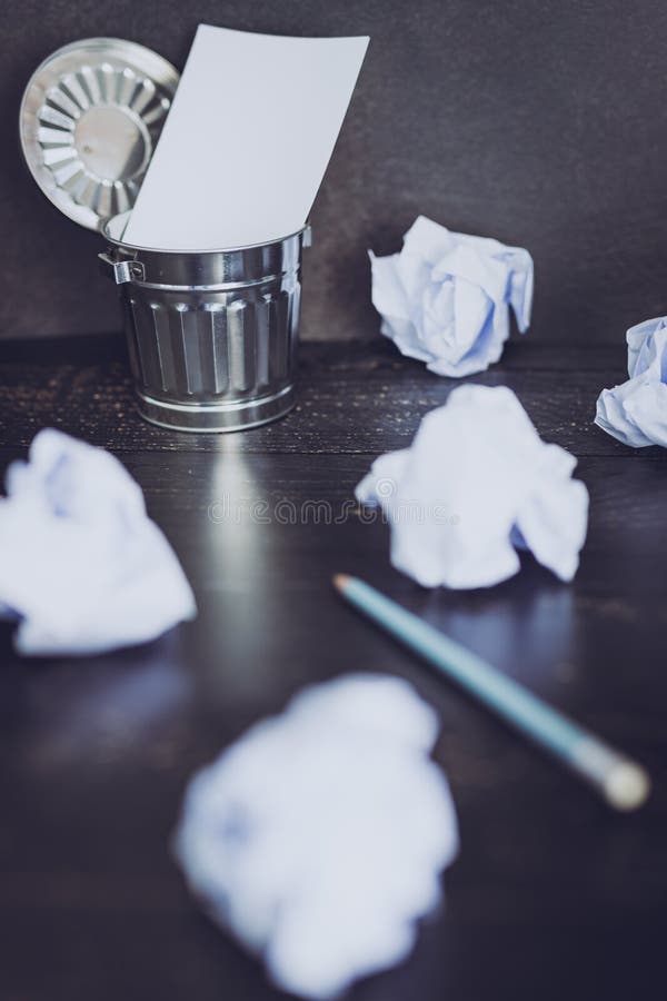 Garbage Bin on Desk Setting with Empty Notepad and Scrunched Paper ...