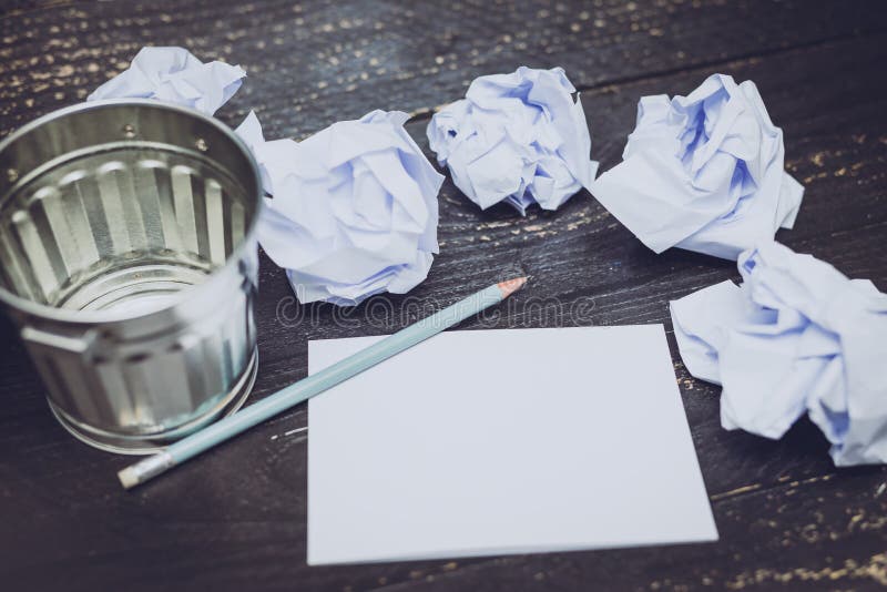 Garbage Bin on Desk Setting with Pencil Notepad and Scrunched Paper ...