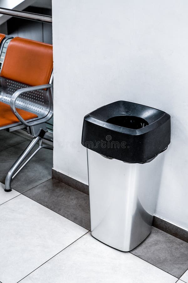 Garbage Bin on the Floor in a Room. Garbage Can in Restroom with Black ...