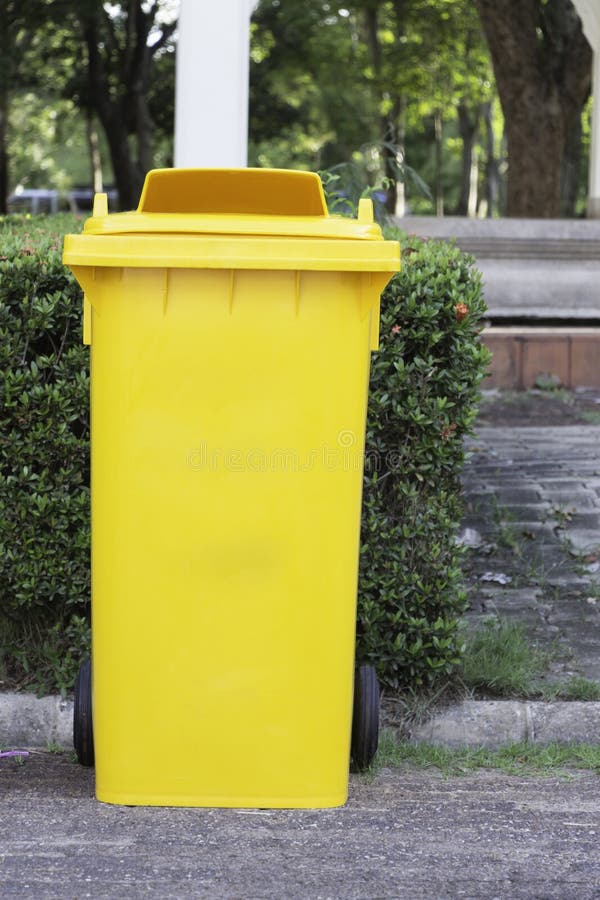 Garbage bin stock photo. Image of wheel, bins, yellow - 58056642