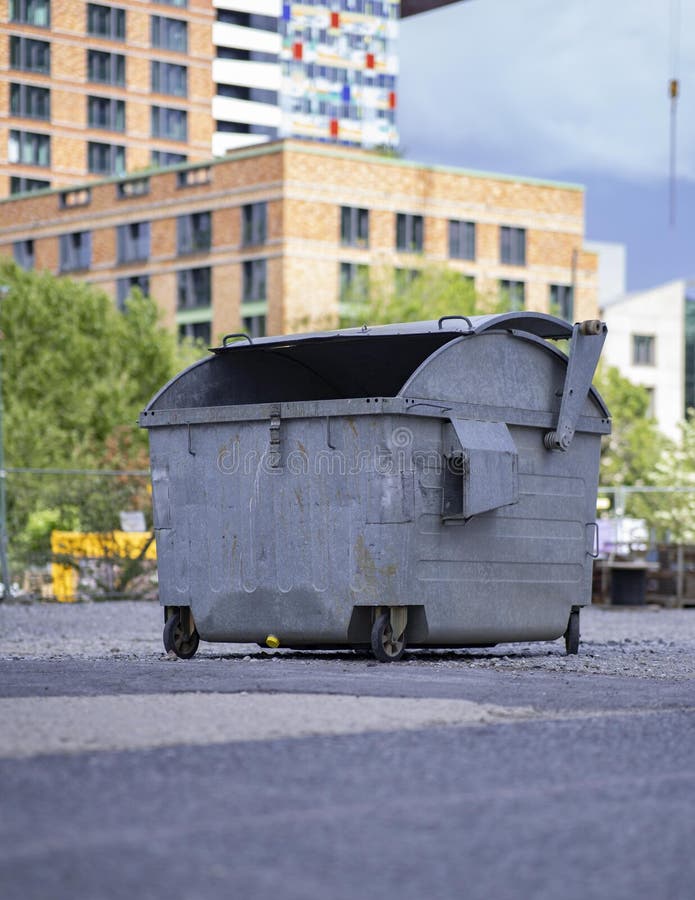 Garbage Bin on a Stone Field Stock Image - Image of stone, track: 228340397