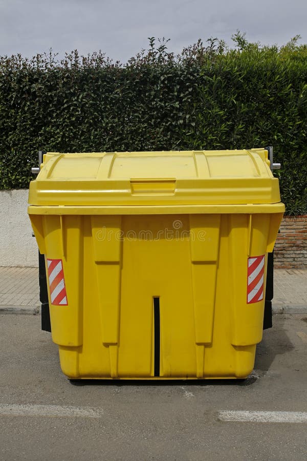 Yellow Garbage Bin On The Street Stock Photo - Image of public, recycle ...
