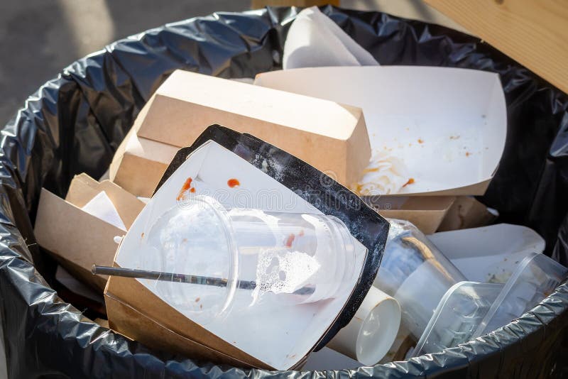 Garbage Bin with Unsorted Recyclable Waste. Cardboard Boxes, Paper ...