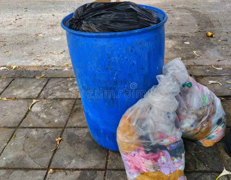 Plastic Bags and Garbage, Garbage Bins Full of Trash in the Public Area ...