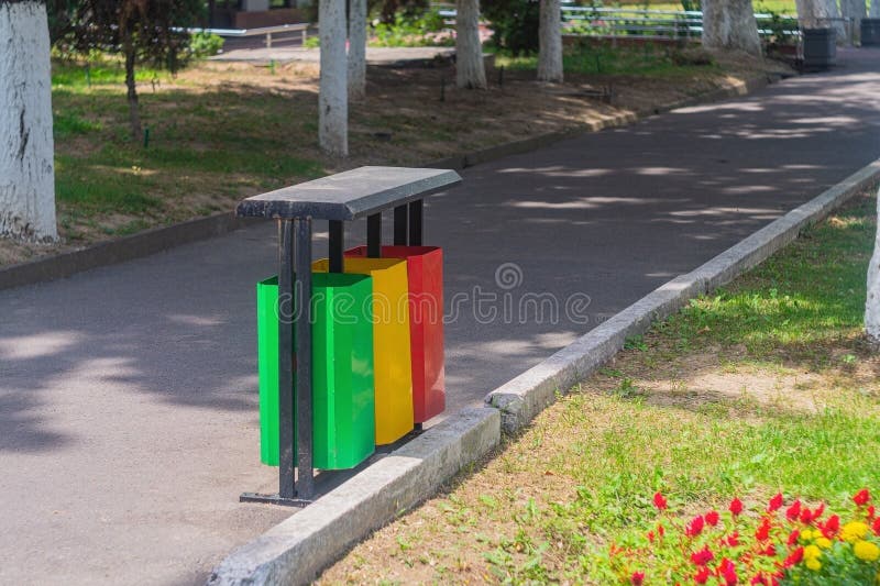 Garbage Bins in the Park are Marked by the Colors of the Traffic Lights ...
