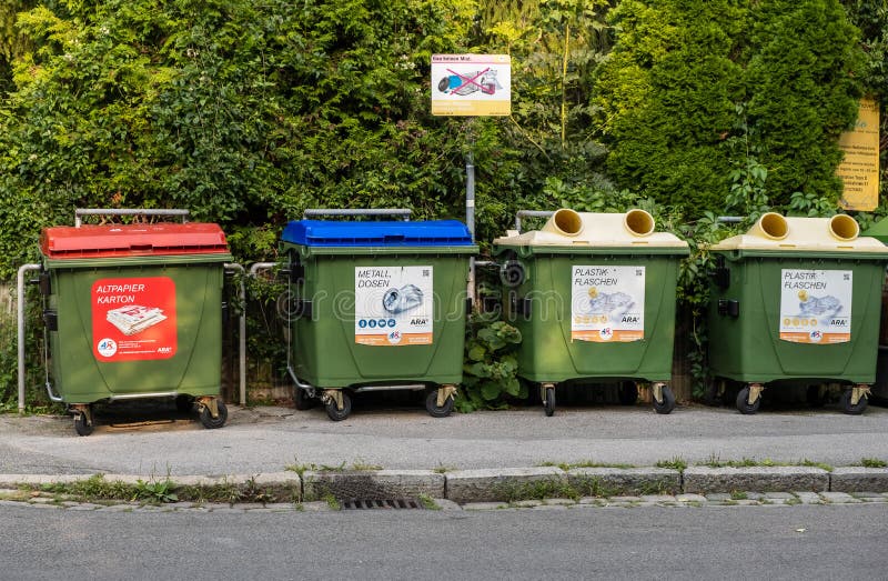 Bins for Recycling and Garbage Collection Worker in the City Aosta ...