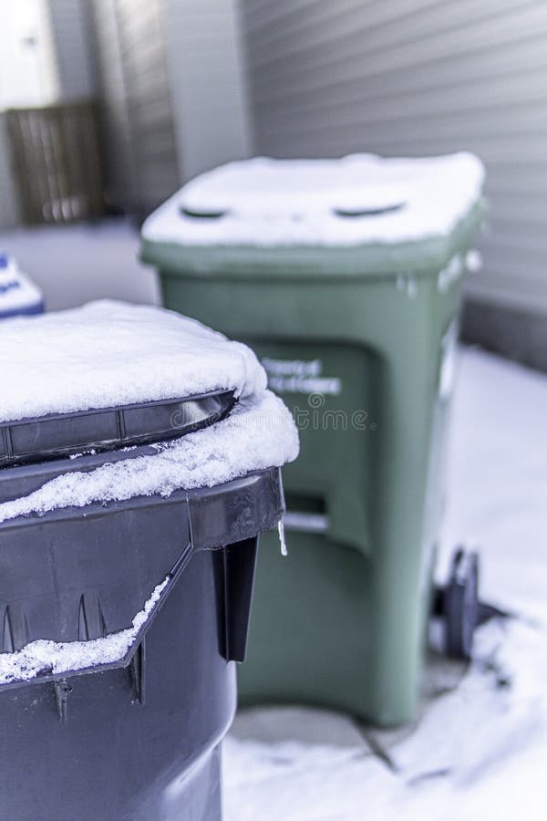 Garbage Bins in Winter Covered in Snow Stock Photo - Image of ...