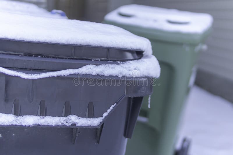 Garbage Bins in Winter Covered in Snow Stock Photo - Image of ...