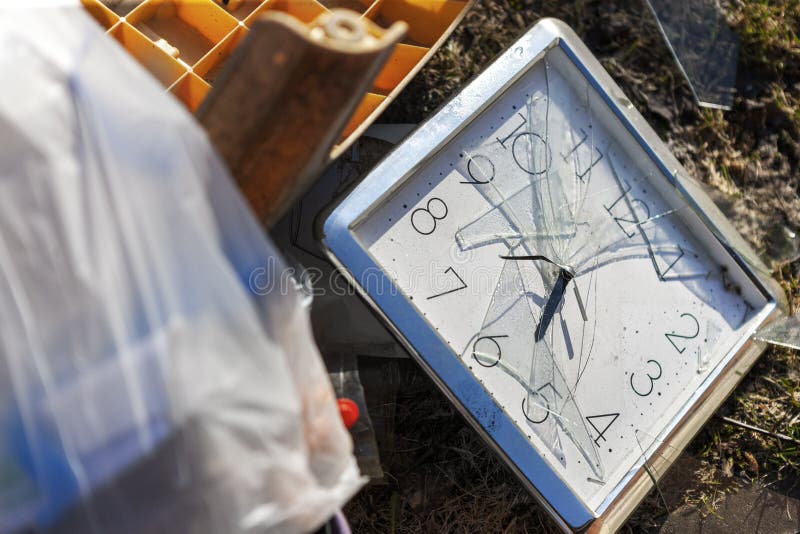 Garbage and broken clock stock photo. Image of garbage - 258308862