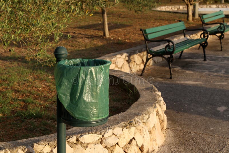 Garbage Can. Empty Trash Can in a City Park Stock Photo - Image of blue ...