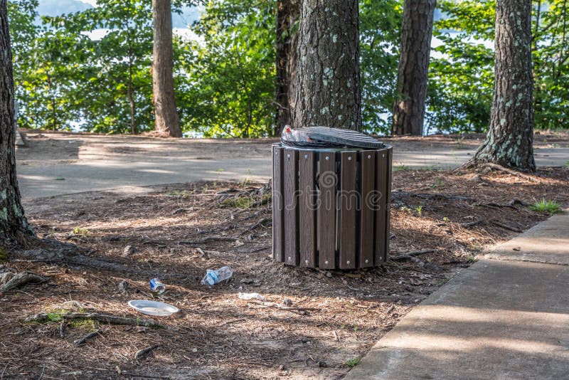 Garbage can in a park stock image. Image of debris, improvement - 176572371