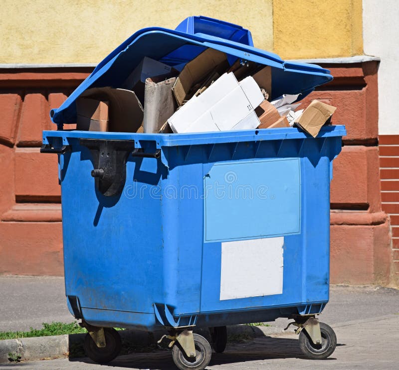 Garbage can on the street stock image. Image of yellow - 61109013