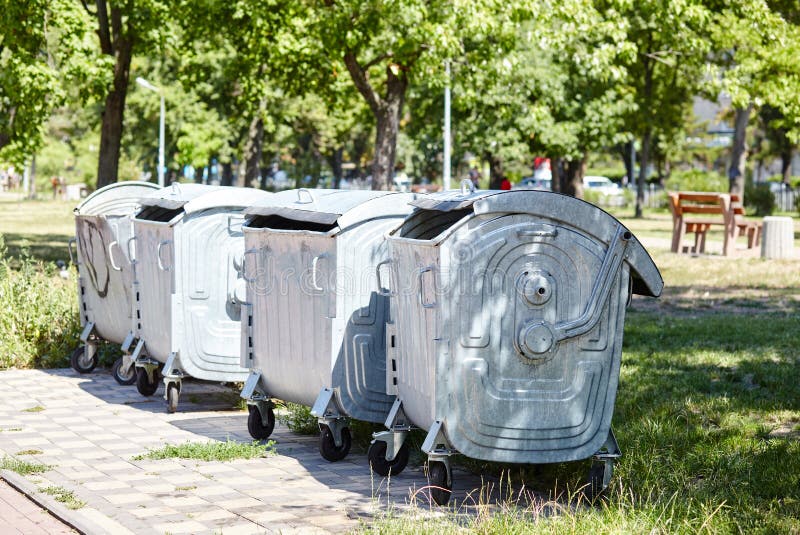 Garbage Cans in the City Park. Garbage Container in a Public Park Stock ...