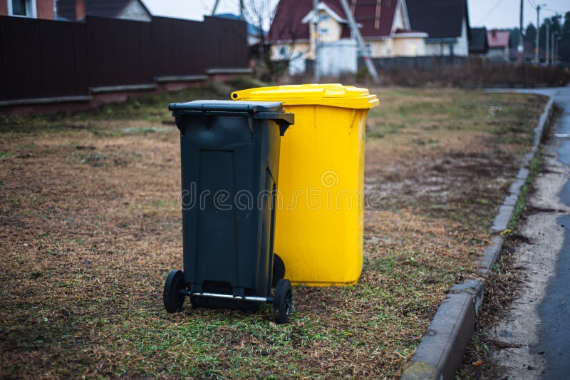 Garbage Cans in Different Colors Symbolizing Recycling Stock Photo ...