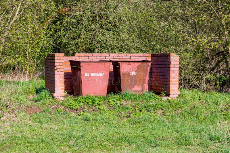 Garbage Cans in Nature in a Brick Shelter, Garbage Disposal Site ...