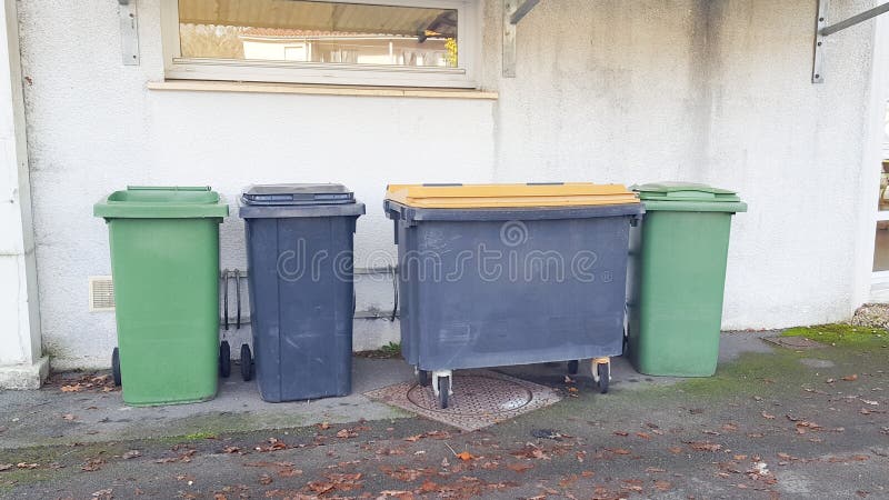 Garbage Cans are Outside the Building Waiting for Garbage Collection ...