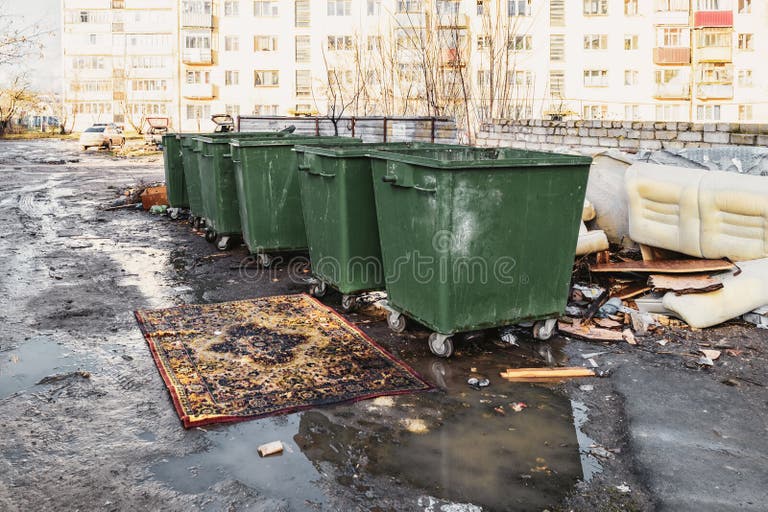 Garbage Cans in a Provincial Russian Yard and a Chic Carpet in Front of ...