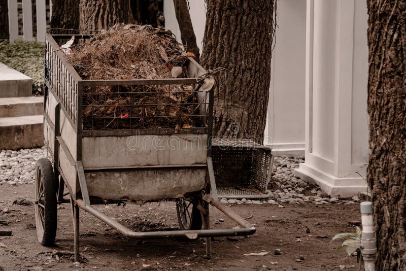 Garbage Cart with Two Wheels on the Ground Stock Image - Image of ...