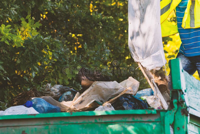 Garbage Collection in the Back of a Truck Stock Image - Image of back ...